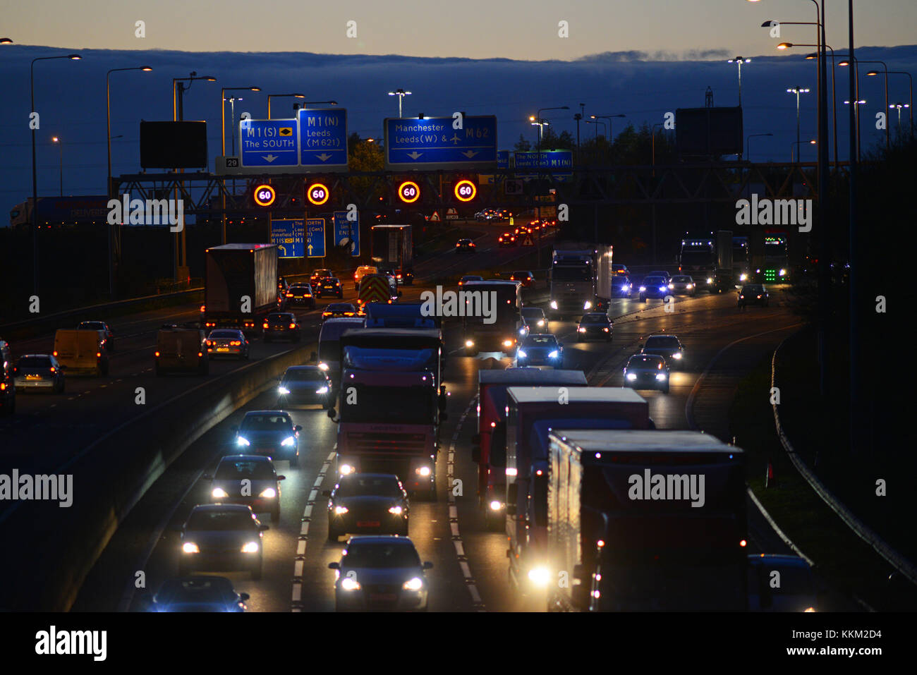 traffic jam by reduced speed limit and speed camera warning signs and ...