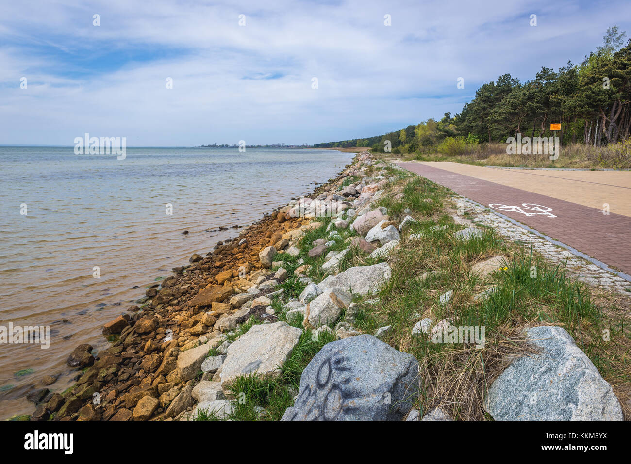 Bicycle path in Jurata town on Hel Peninsula separating bay from open ...