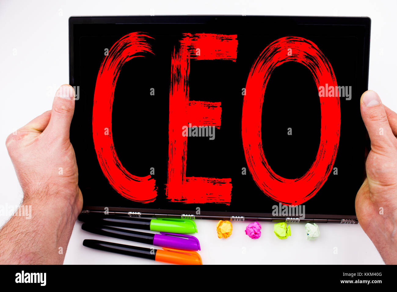 CEO text written on tablet, computer in the office with marker, pen ...
