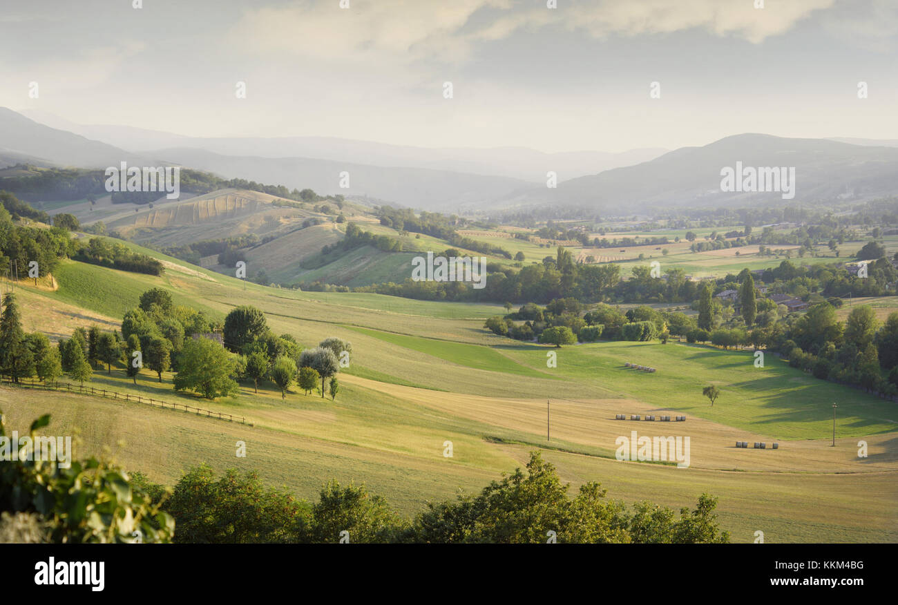 Beautiful view of rolling countryside at sunset, Italy Stock Photo - Alamy