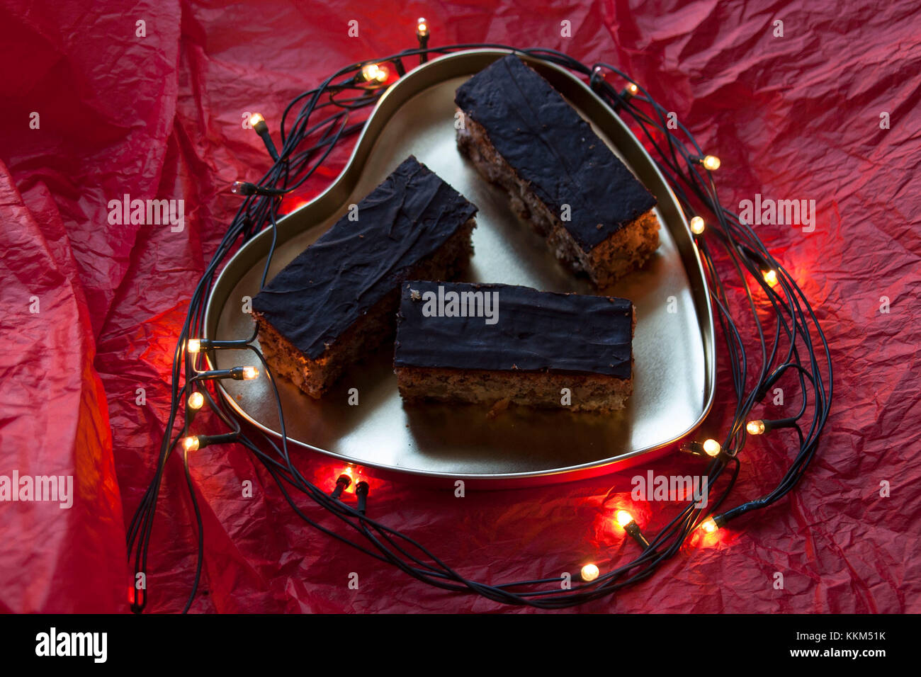 Chocolate cakes in heart shape box with light bulbs Stock Photo - Alamy
