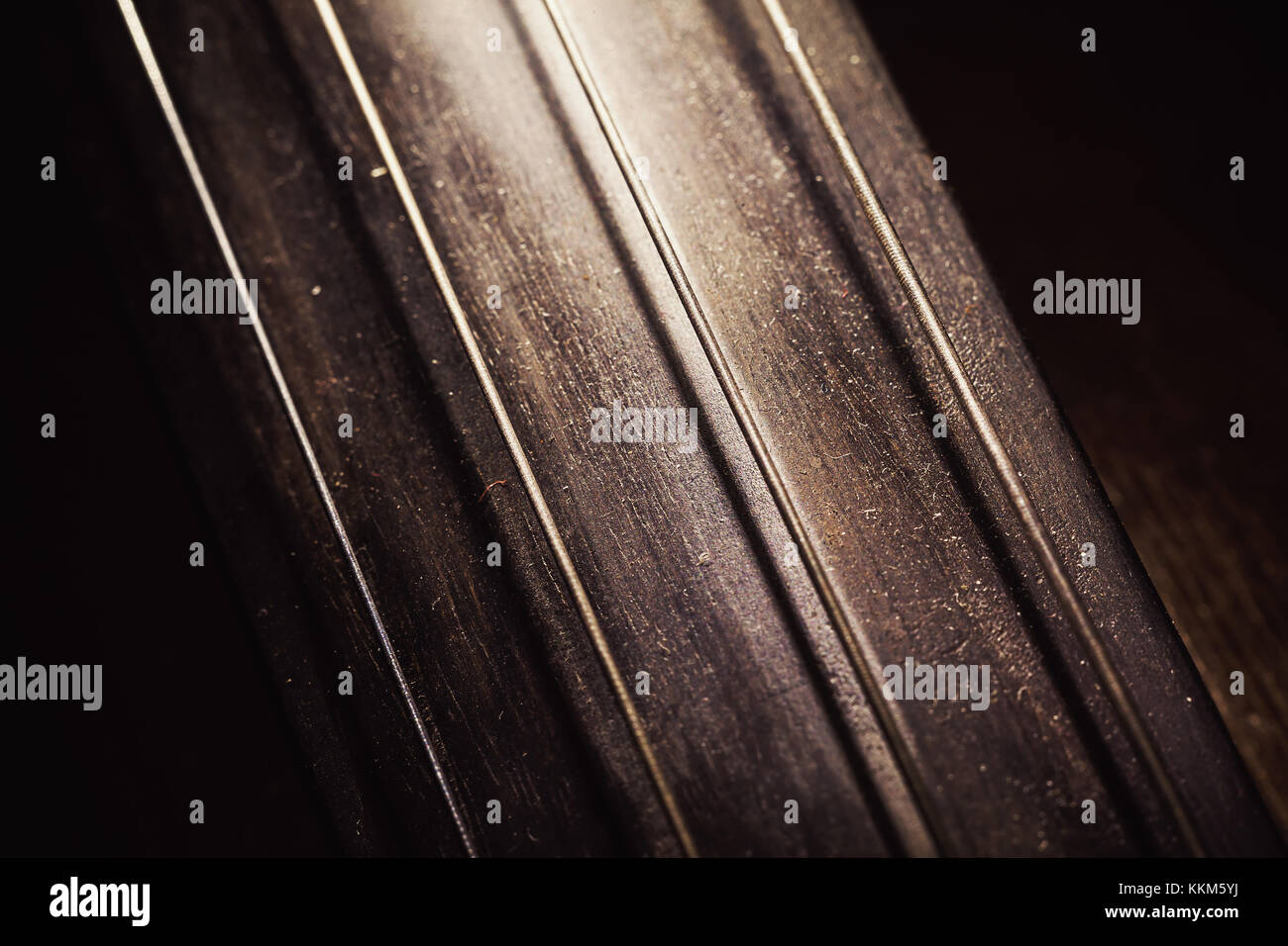 Closeup view of an old dusty cello, accentuated shapes with light Stock ...