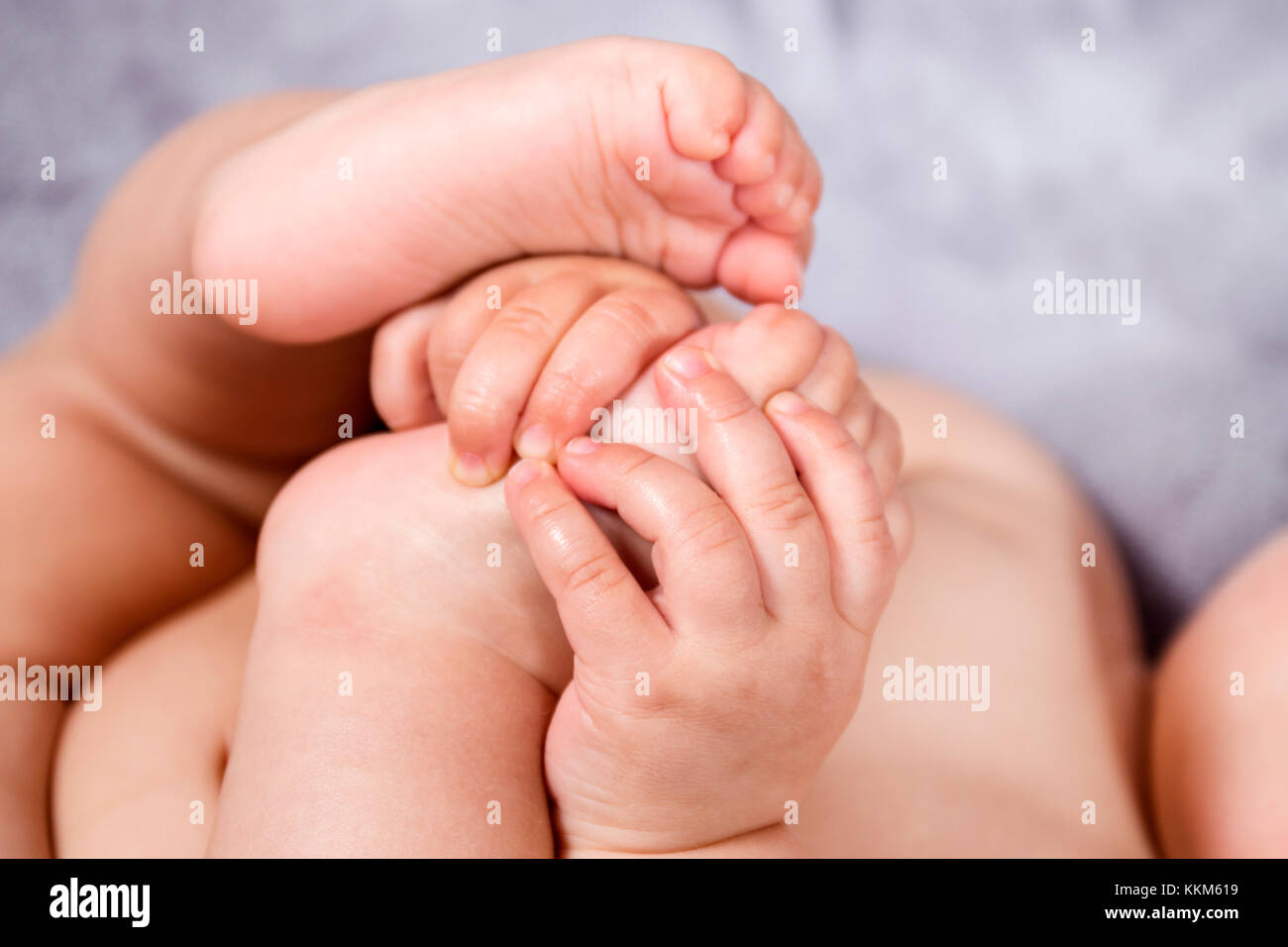 Close up of baby hands and feet of a newborn baby Stock Photo - Alamy