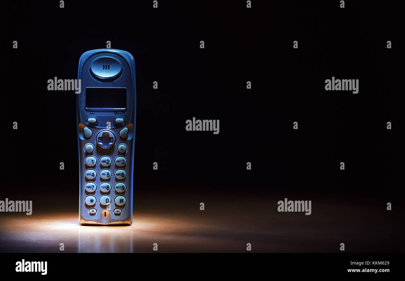 Details of an old dusty wireless telephone Stock Photo - Alamy