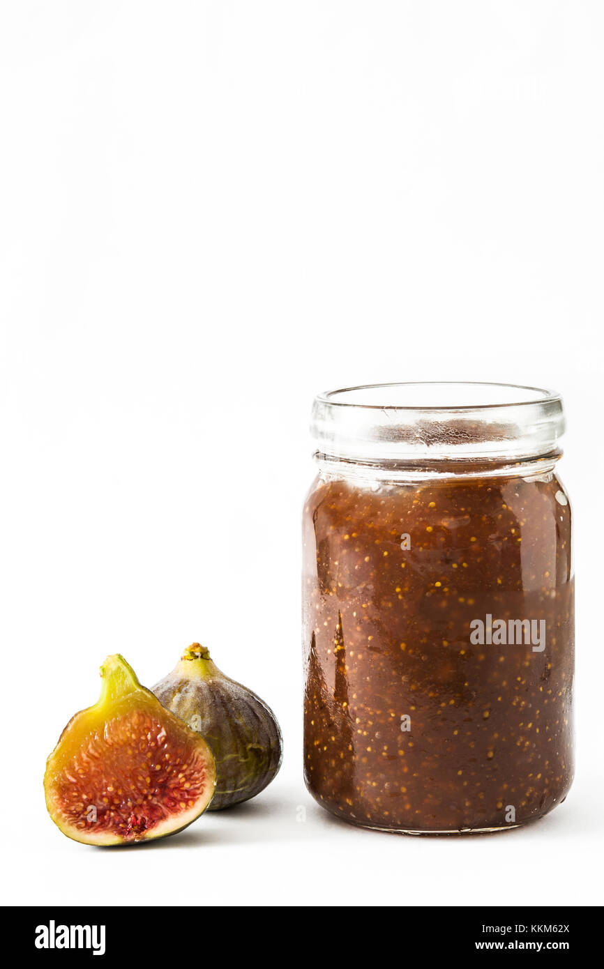 Fig jam isolated on white background Stock Photo - Alamy