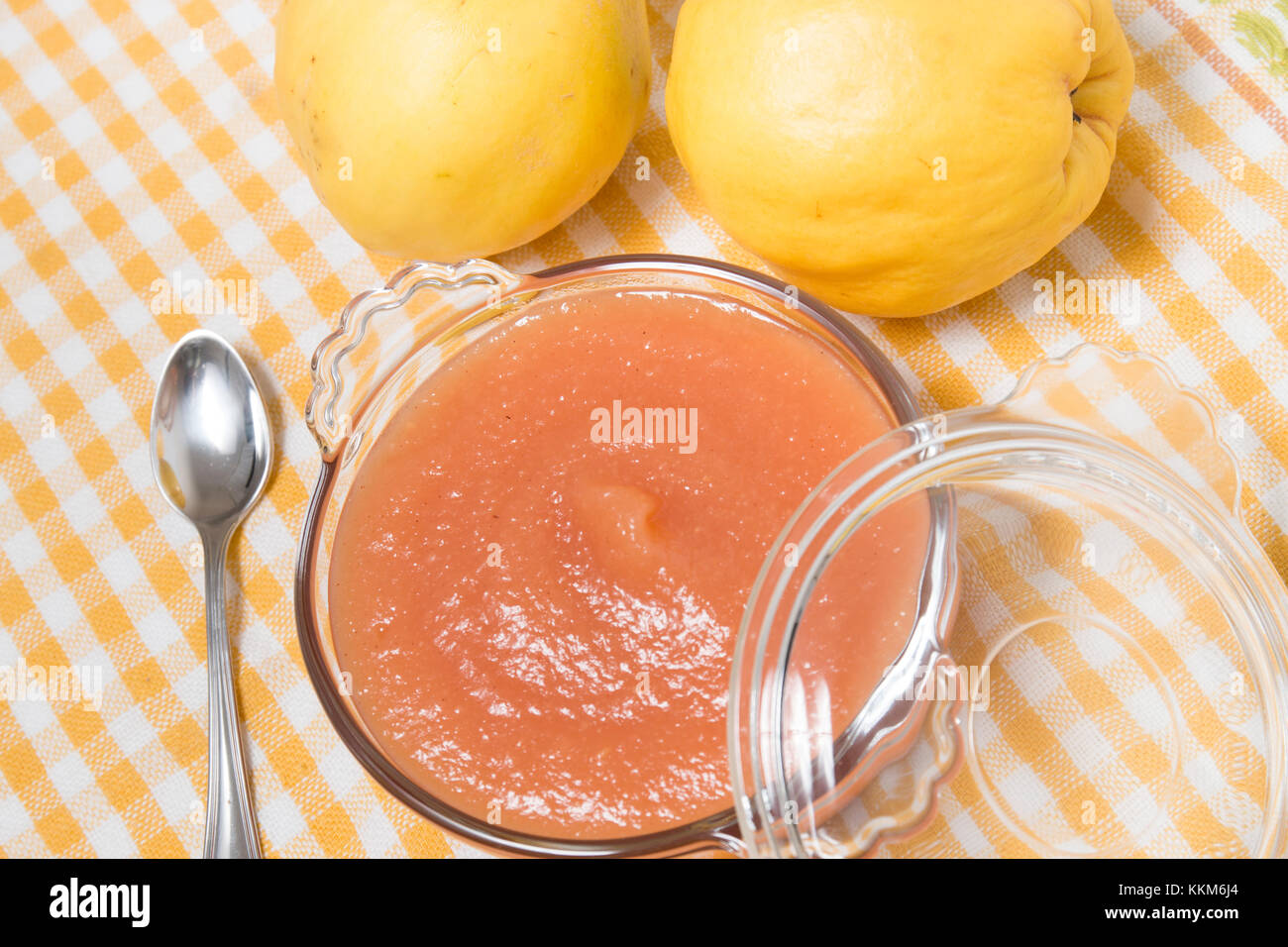 Close up of traditional quince jam homemade with natural ingredients ...