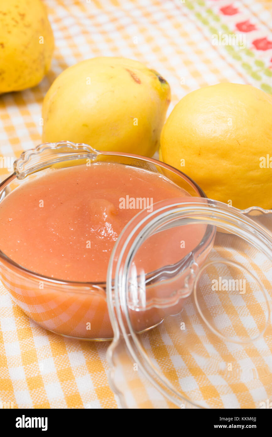 Close up of traditional quince jam homemade with natural ingredients ...