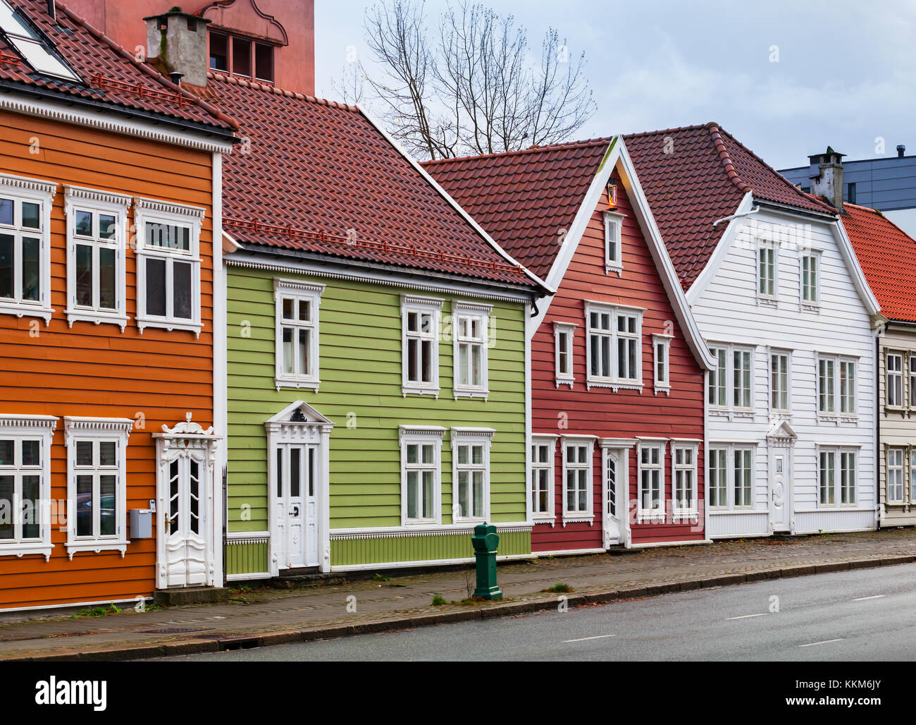 Traditional Norwegian red wooden houses. Street of old Bergen, Norway ...