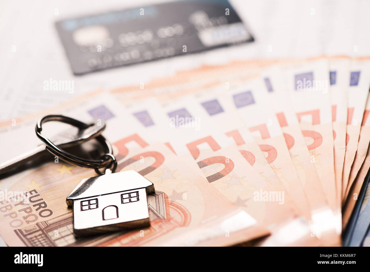 House key on euro Banknotes Stock Photo - Alamy