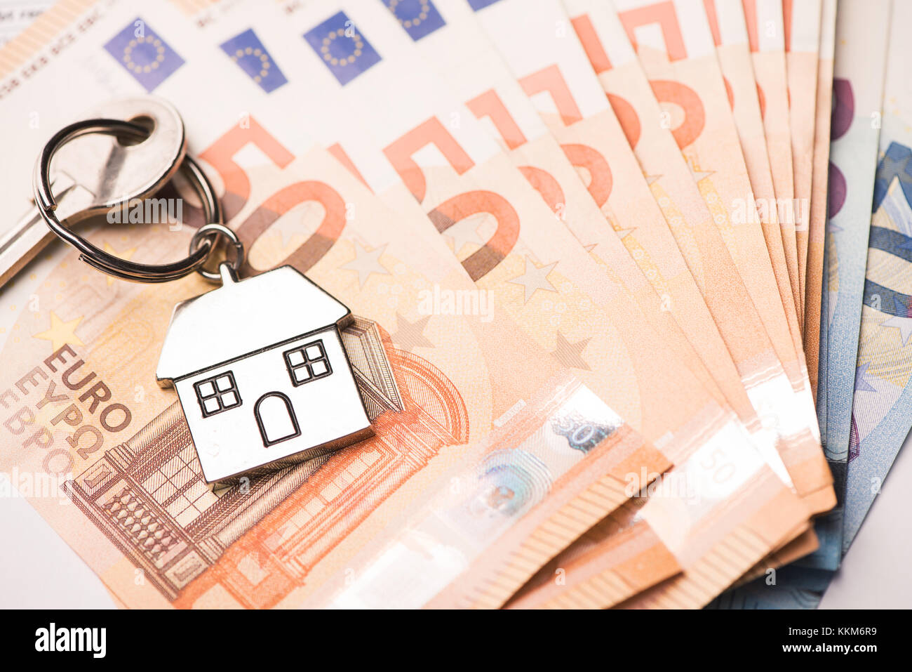 House key on euro Banknotes Stock Photo - Alamy