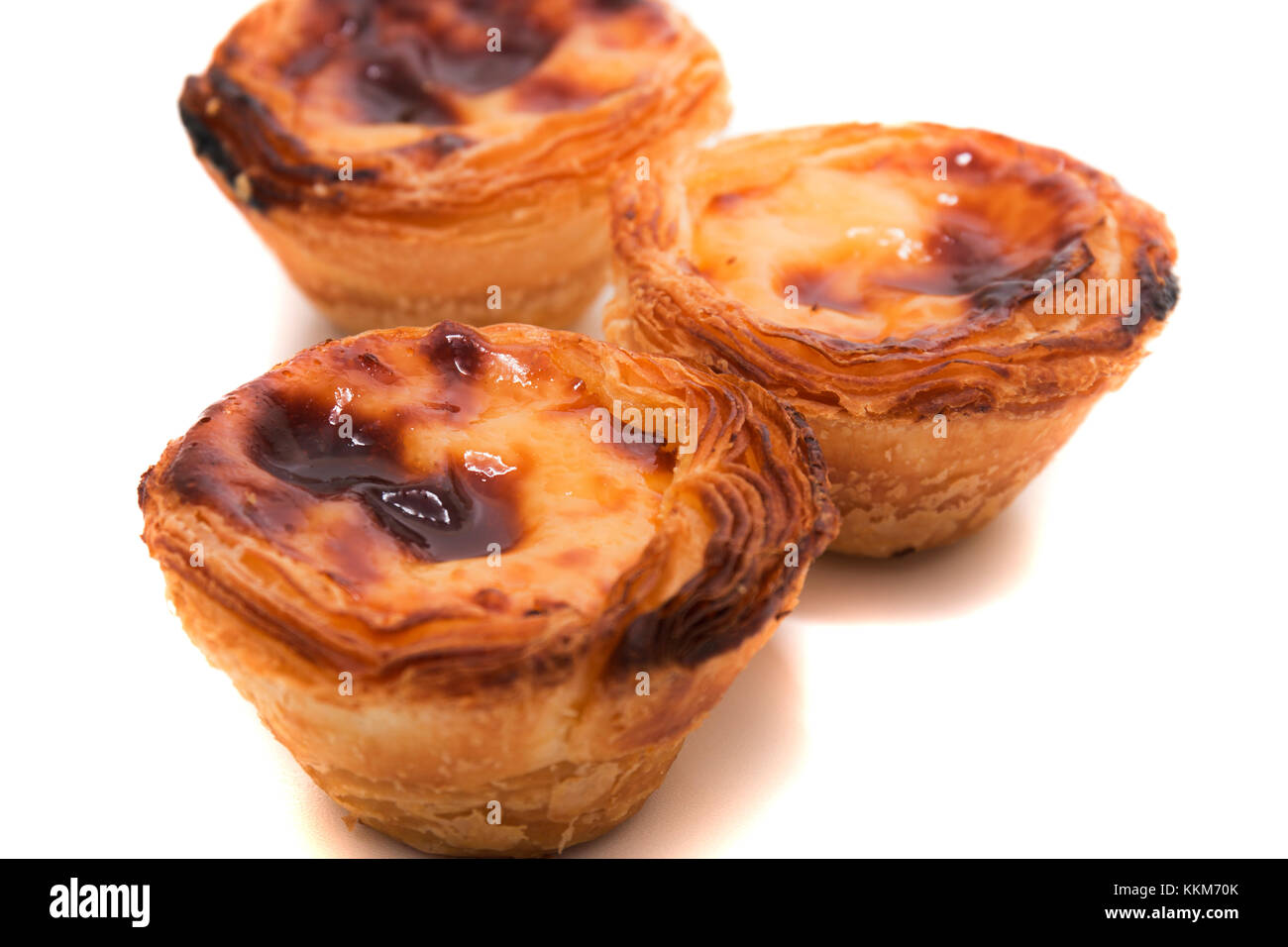 Famous Portuguese egg pastry tart called 'Pastel de Belem' isolated on ...
