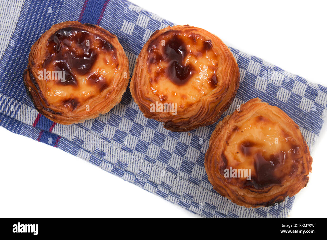 Famous Portuguese egg pastry tart called 'Pastel de Belem' isolated on ...