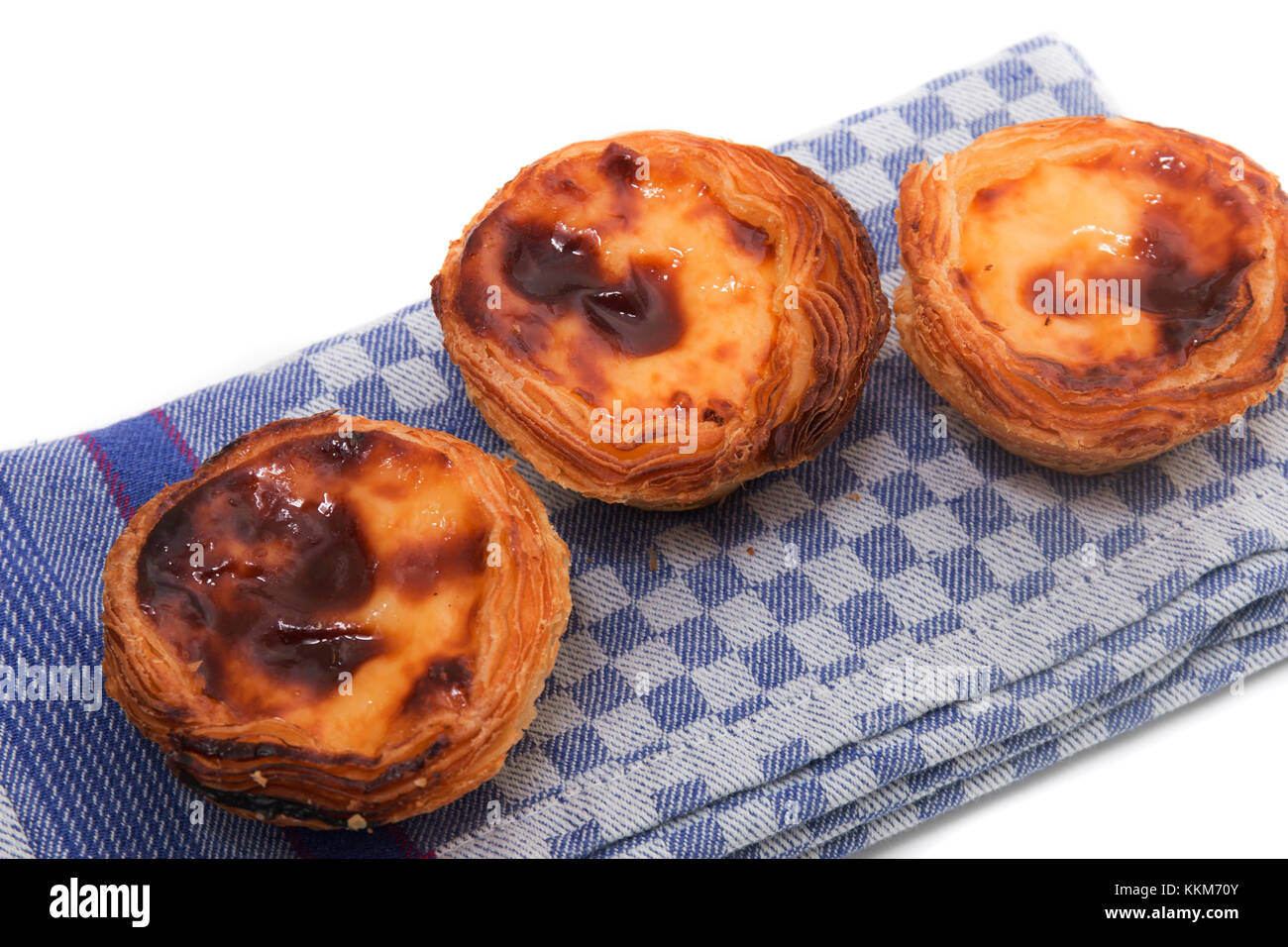 Famous Portuguese egg pastry tart called 'Pastel de Belem' isolated on ...