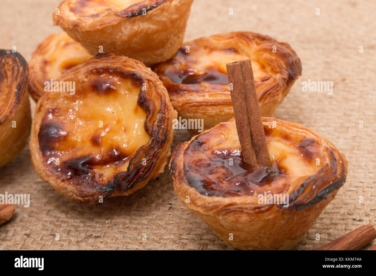Famous Portuguese egg pastry tart called 'Pastel de Belem' on hessian ...