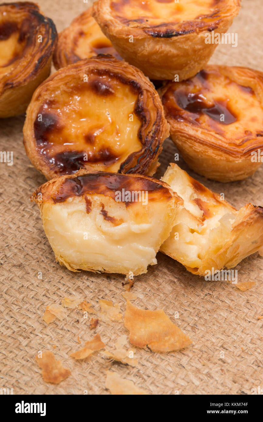 Famous Portuguese egg pastry tart called 'Pastel de Belem' on hessian ...