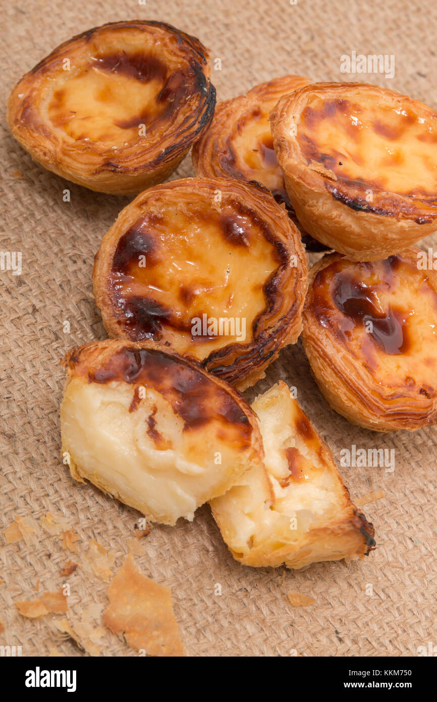 Famous Portuguese egg pastry tart called 'Pastel de Belem' on hessian ...