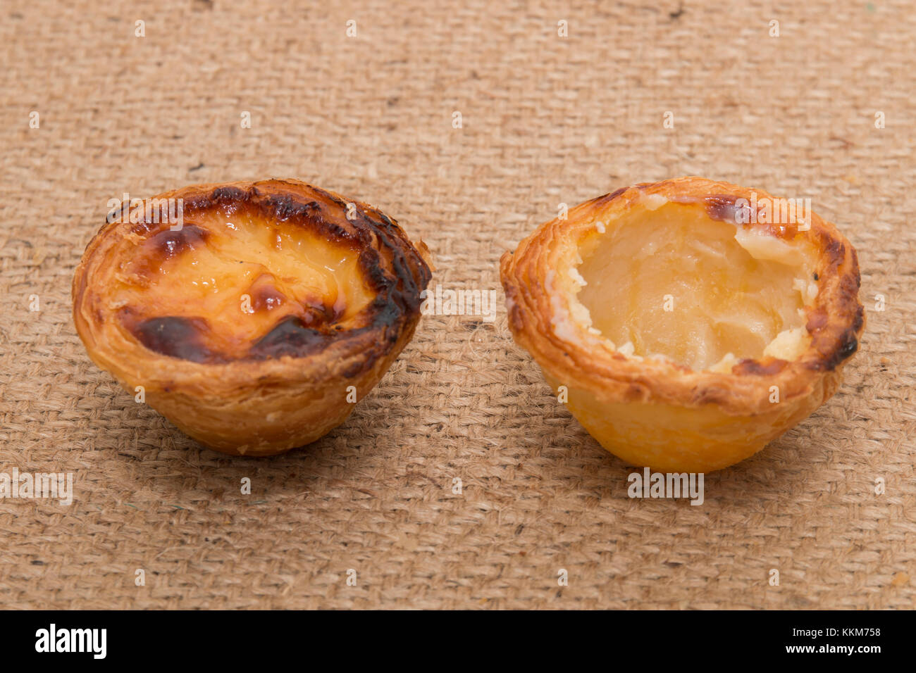 Famous Portuguese egg pastry tart called 'Pastel de Belem' on hessian ...