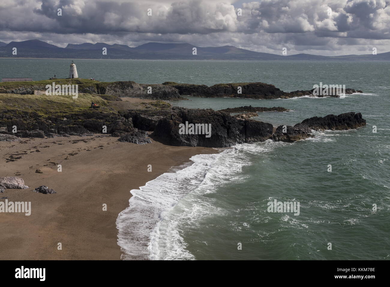 Beautiful sandy coves at the tip of Ynys Llanddwyn island, looking ...