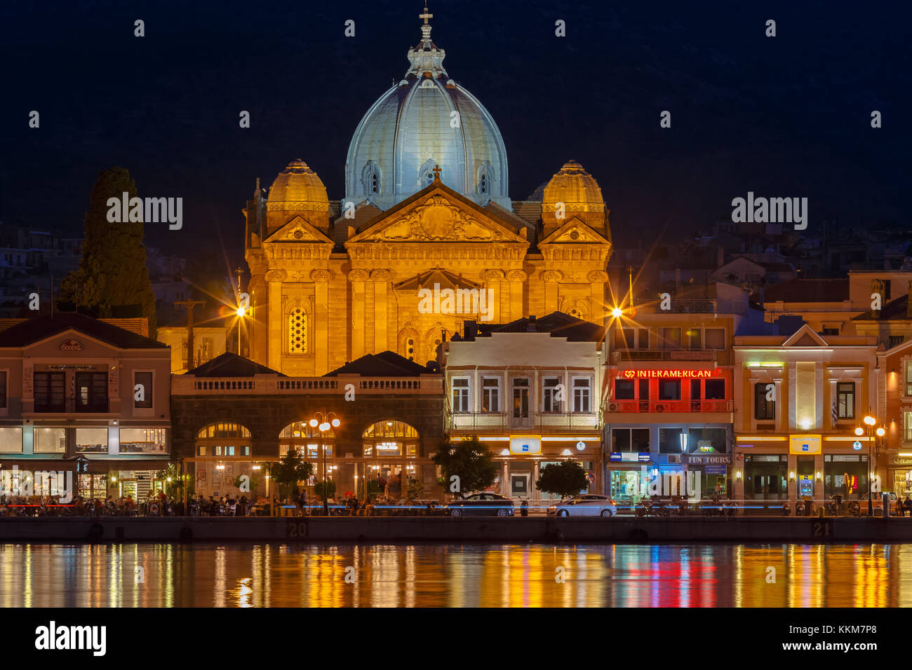 Mytilene seafront with St Therapontas cathedral temple in the evening ...