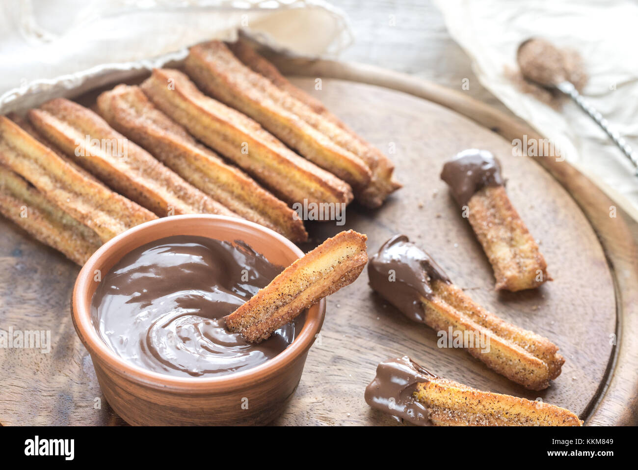 Churros - famous Spanish dessert with chocolate sauce Stock Photo - Alamy