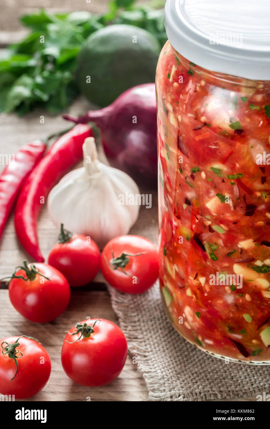 Jar of salsa with ingredients Stock Photo - Alamy