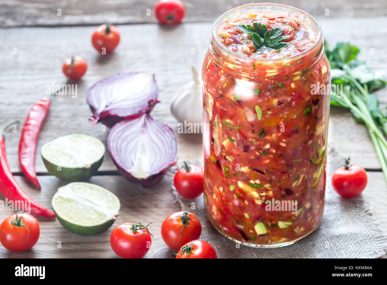 Jar of salsa with ingredients Stock Photo - Alamy