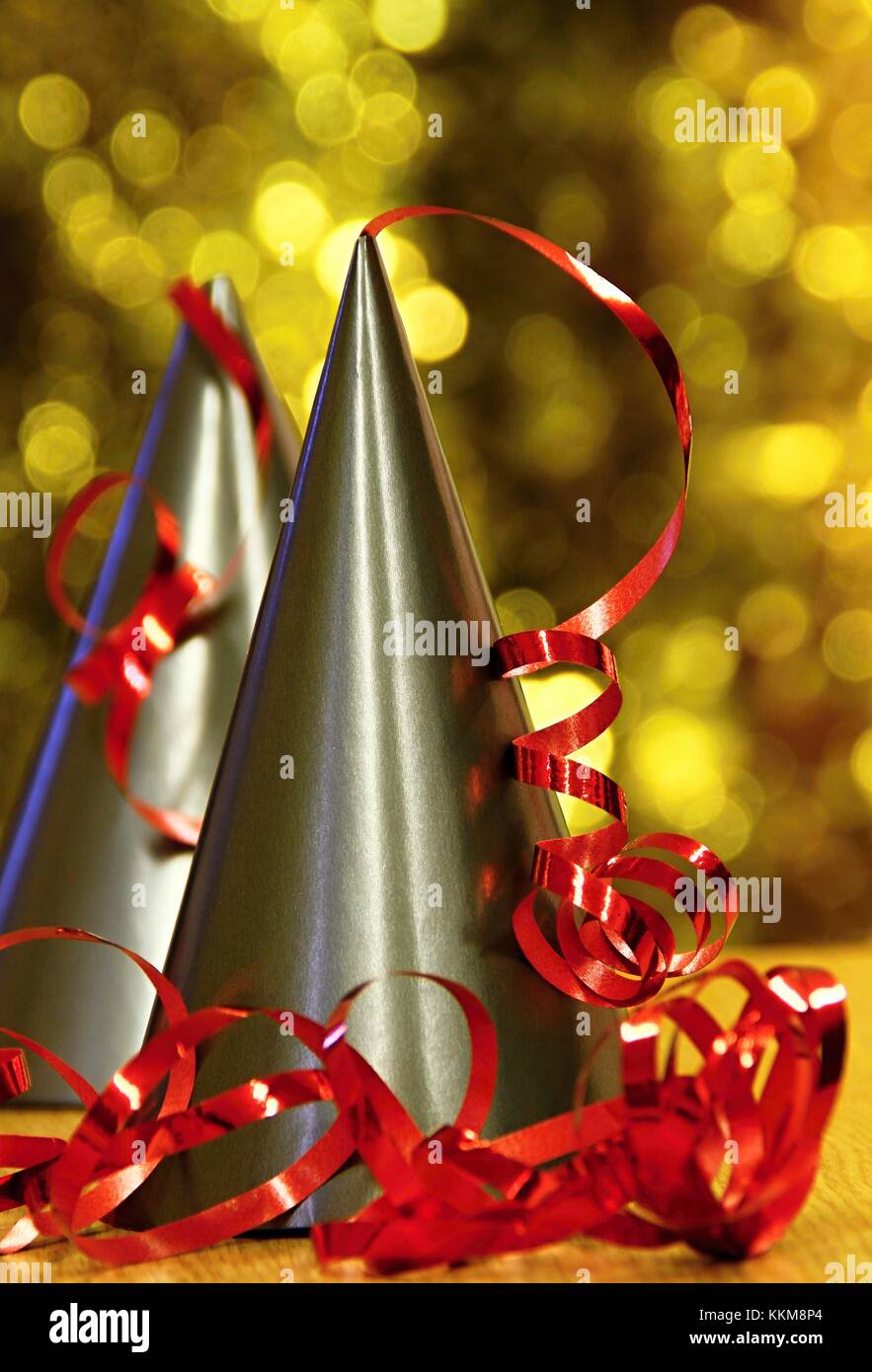 Image of New years eve celebration with hats on a table top in year ...