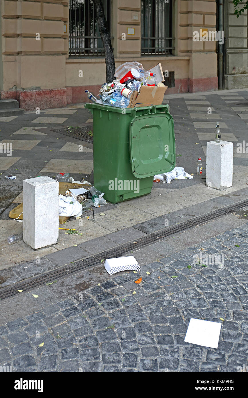 Overflow of Garbage Litter in Plastic Bin Stock Photo - Alamy