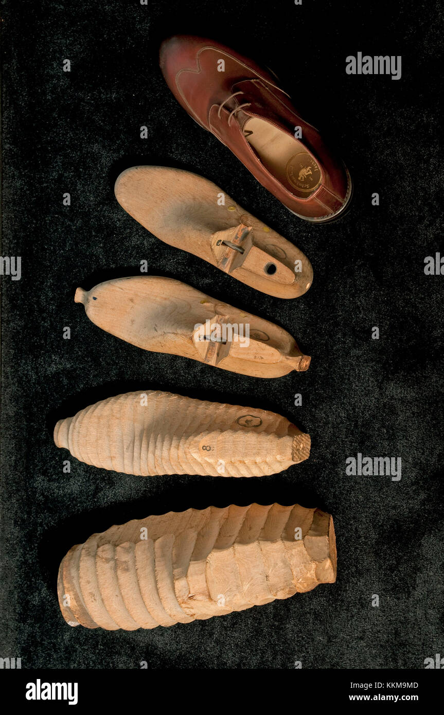 Handmade wooden models in shoemaker's workshop, work piece from rough ...