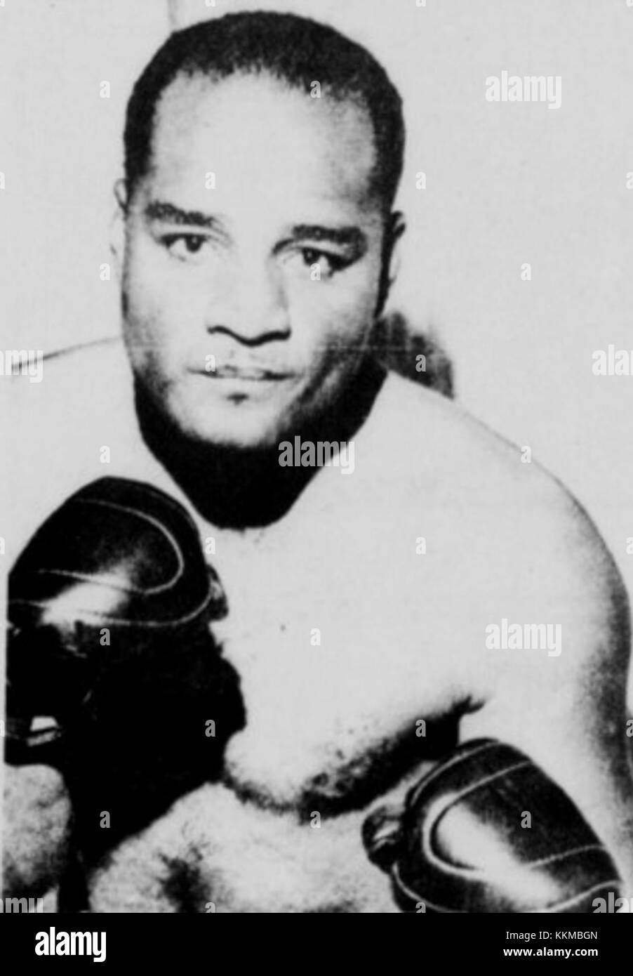 This image likely depicts Zora Folley, a professional boxer, captured ...