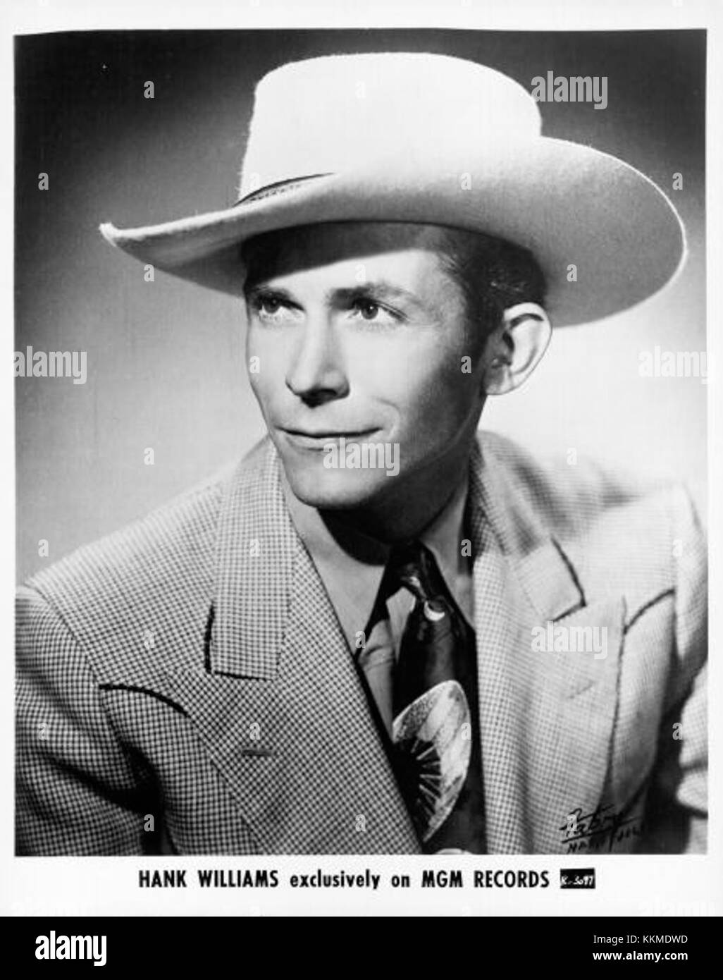 This portrait features country singer Hank Williams, captured in ...
