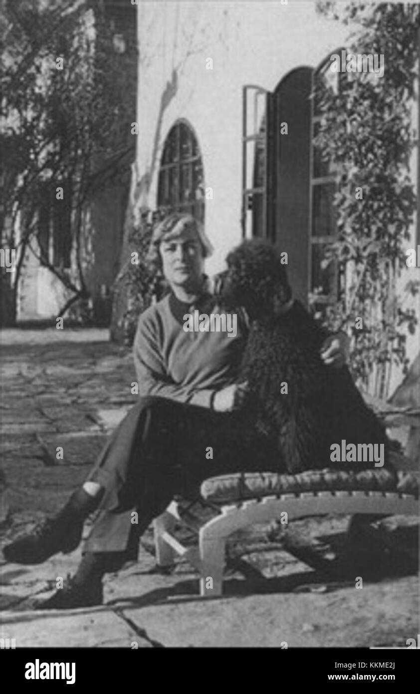 This photograph shows Isabel with her dog, Heine, capturing a peaceful ...