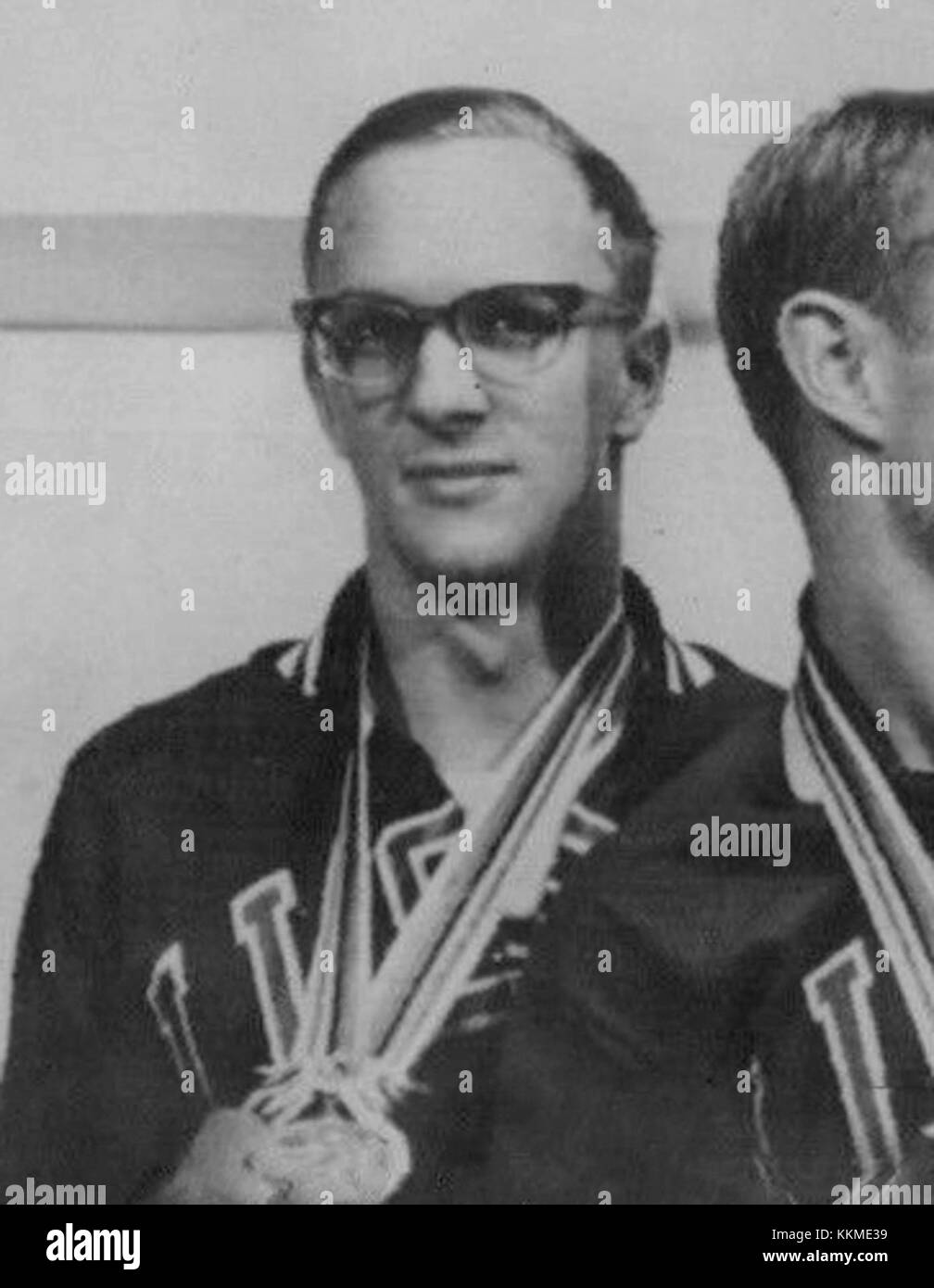 The image likely shows Fred Schmidt, a figure from 1964, involved in a ...