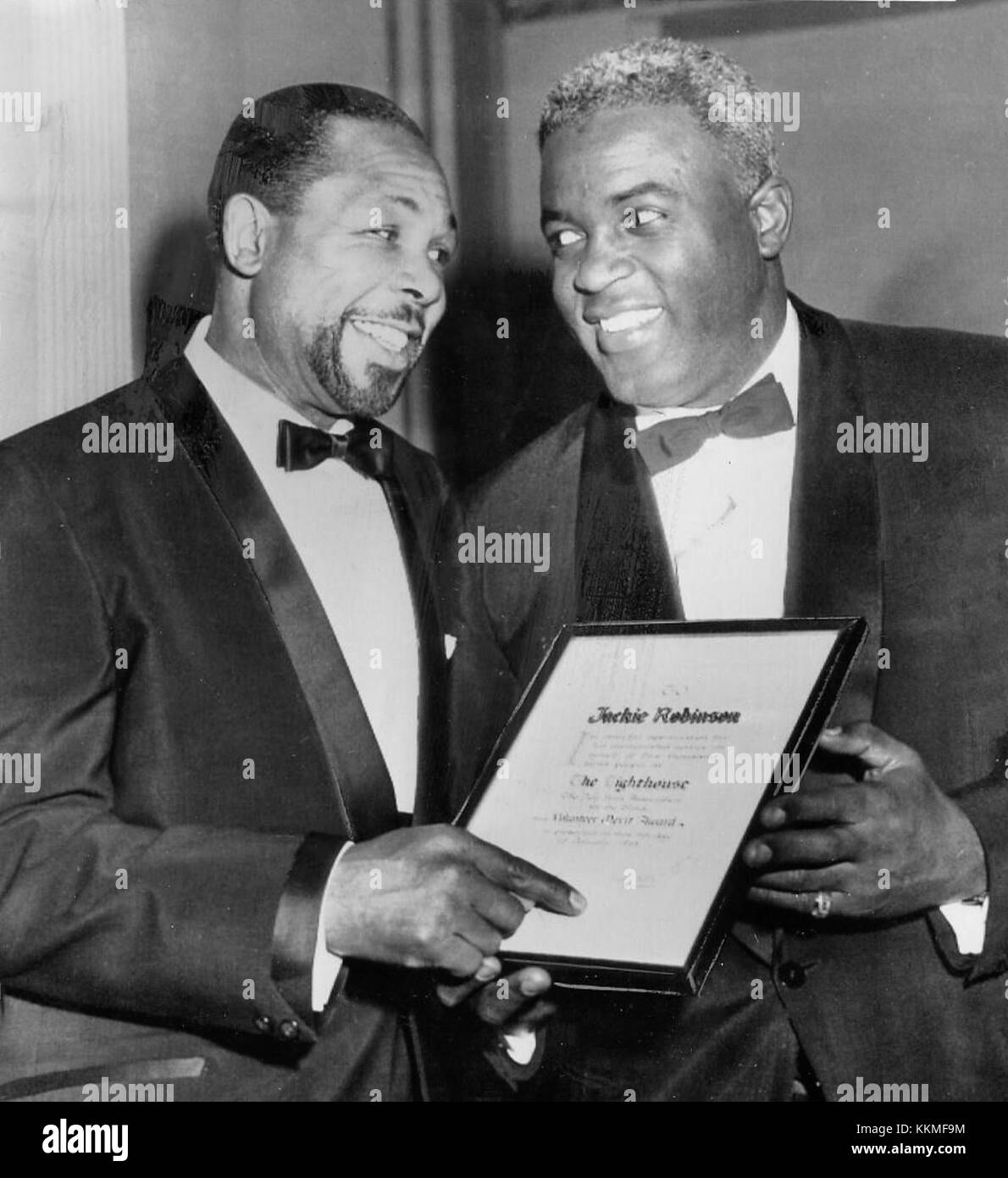 Archie Moore, a boxing champion, and Jackie Robinson, a baseball legend ...