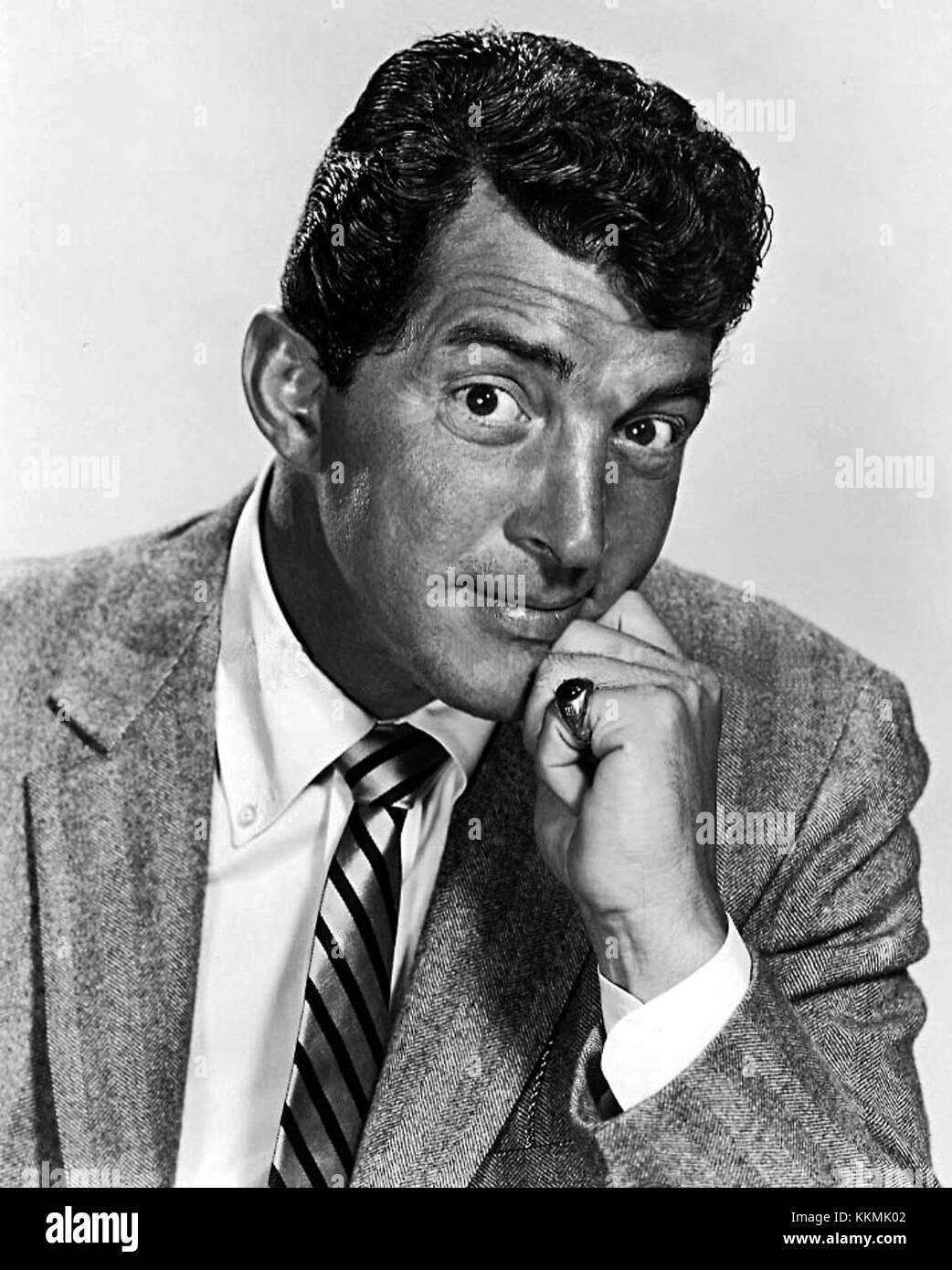 Dean Martin, an iconic American singer, actor, and comedian, is ...