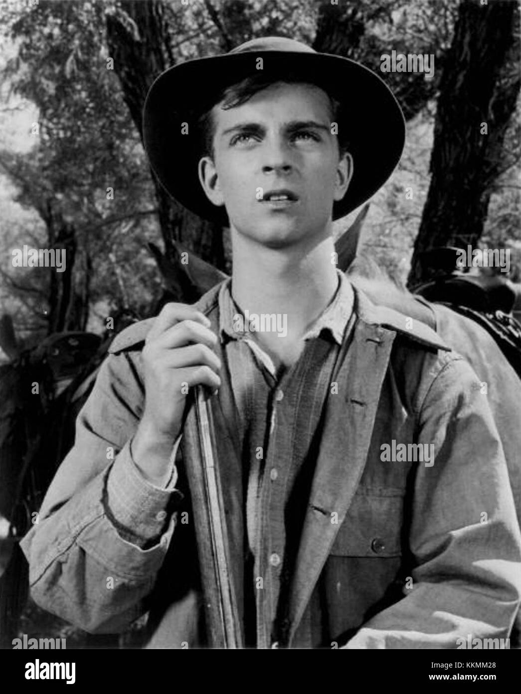 This photograph features Tommy Rettig, the actor known for his role in the TV show *Death Valley ...