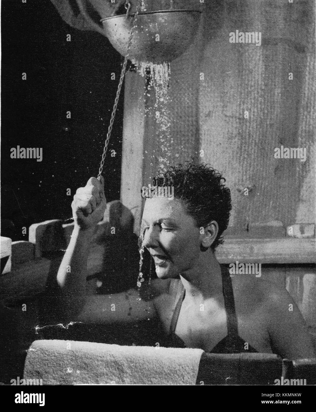 A historical image or scene depicting a wash man involved in the ...