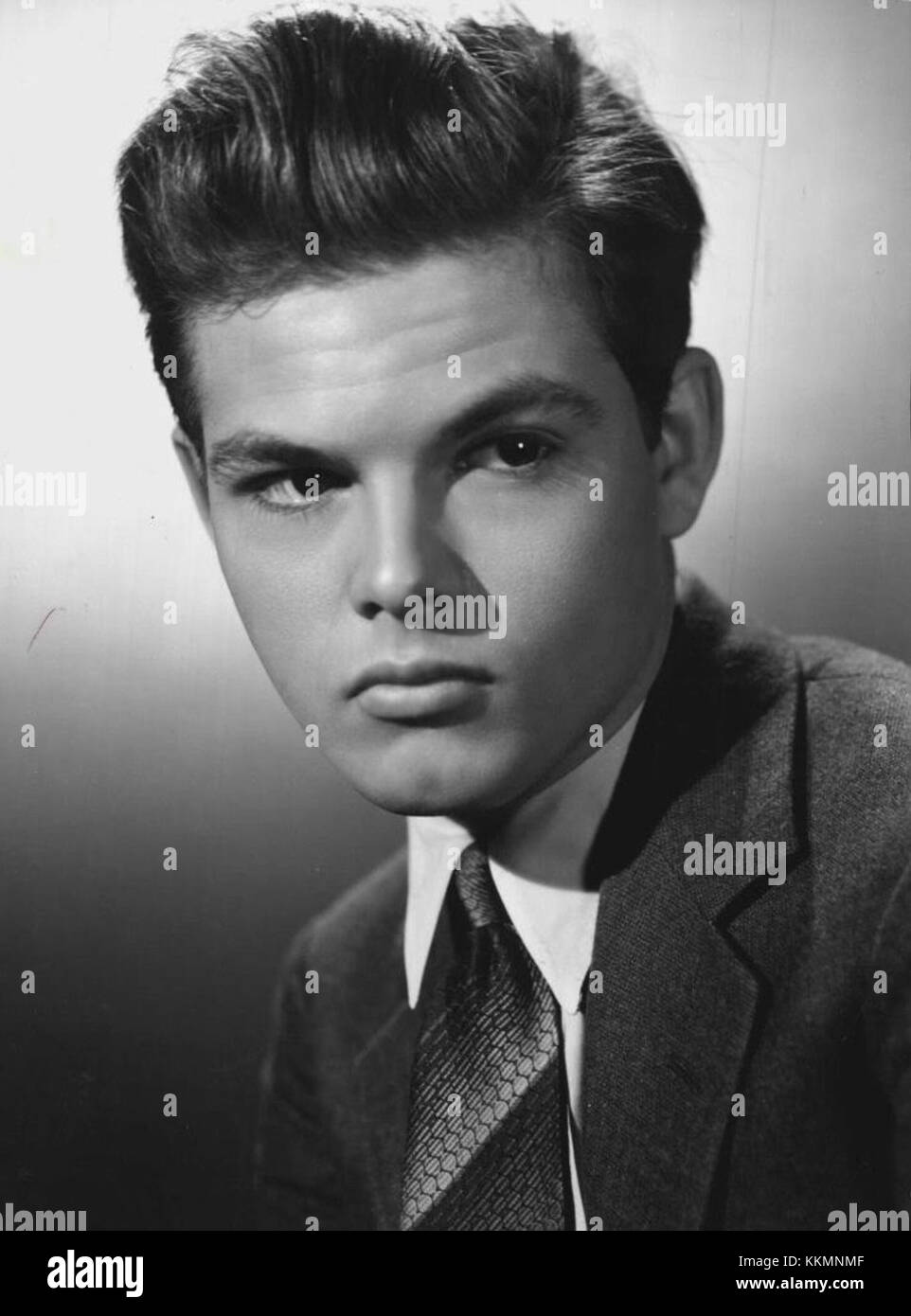 Dickie Moore plays a key role in the 1941 film *Youth Runs Wild*, which explores the lives of ...