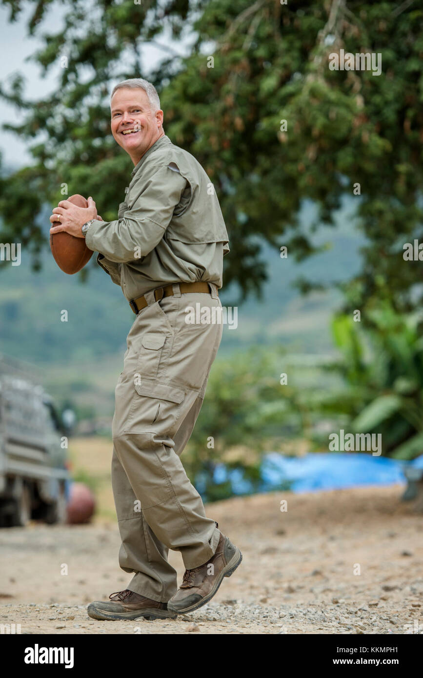 U.S. Navy Rear Adm. Jon Kreitz, left, Defense POW/MIA Agency (DPAA ...