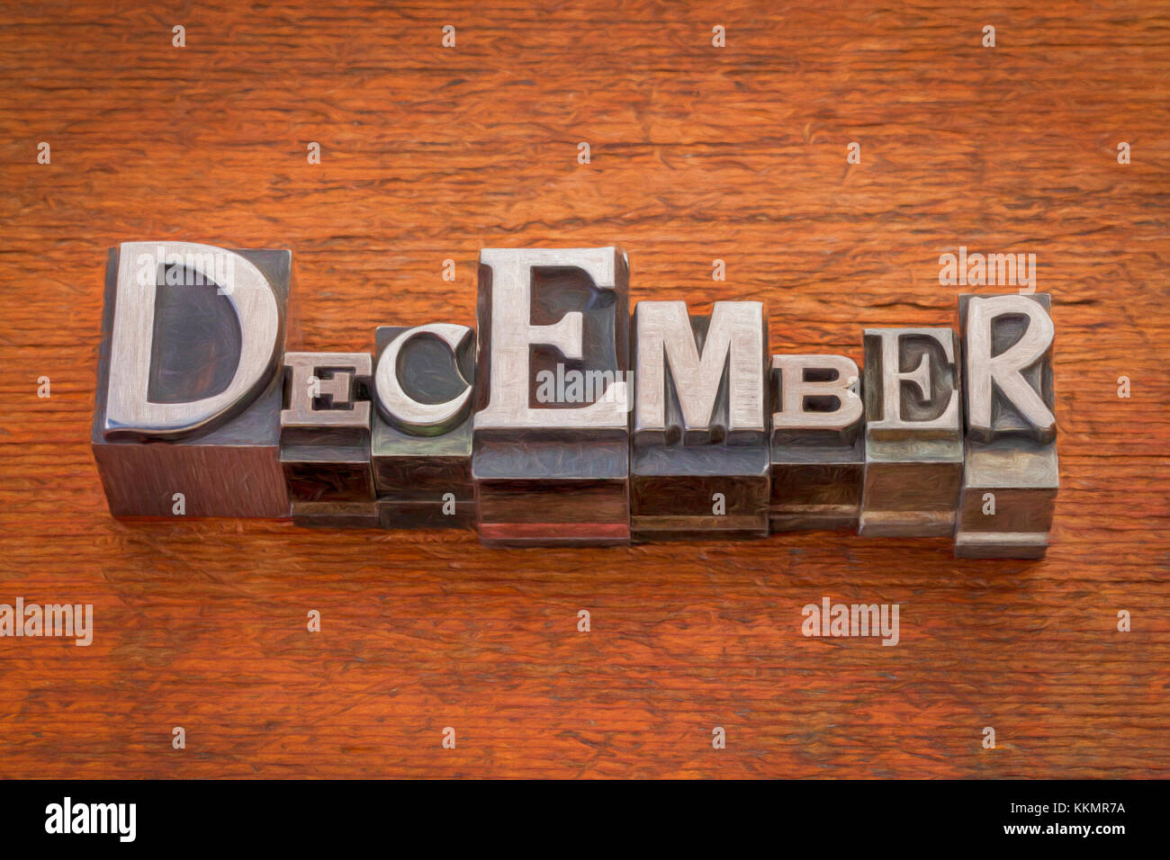 December word in mixed vintage metal type printing blocks over grunge ...