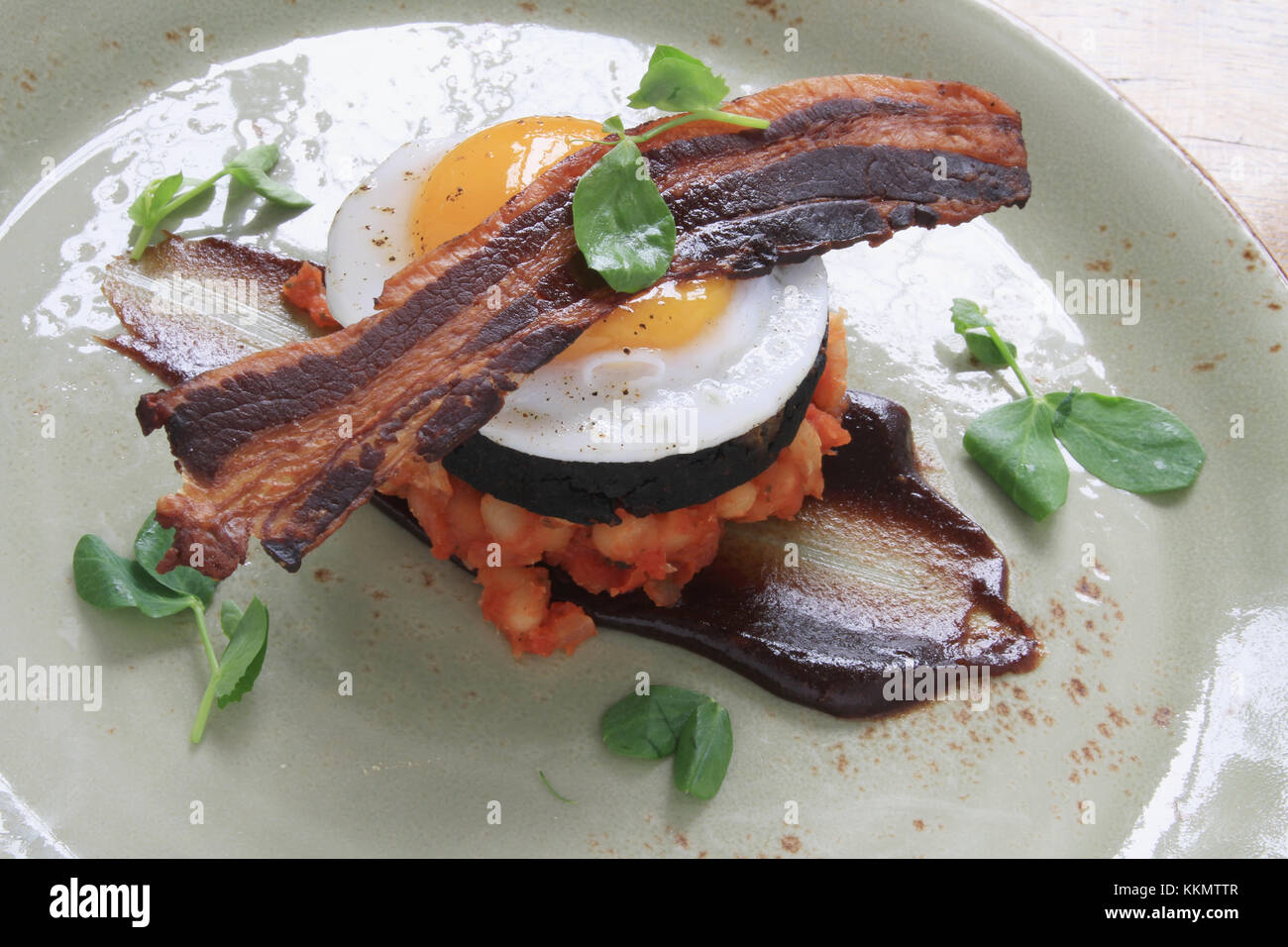 Bacon Egg Black Pudding Baked Beans Plated Meal Stock Photo - Alamy