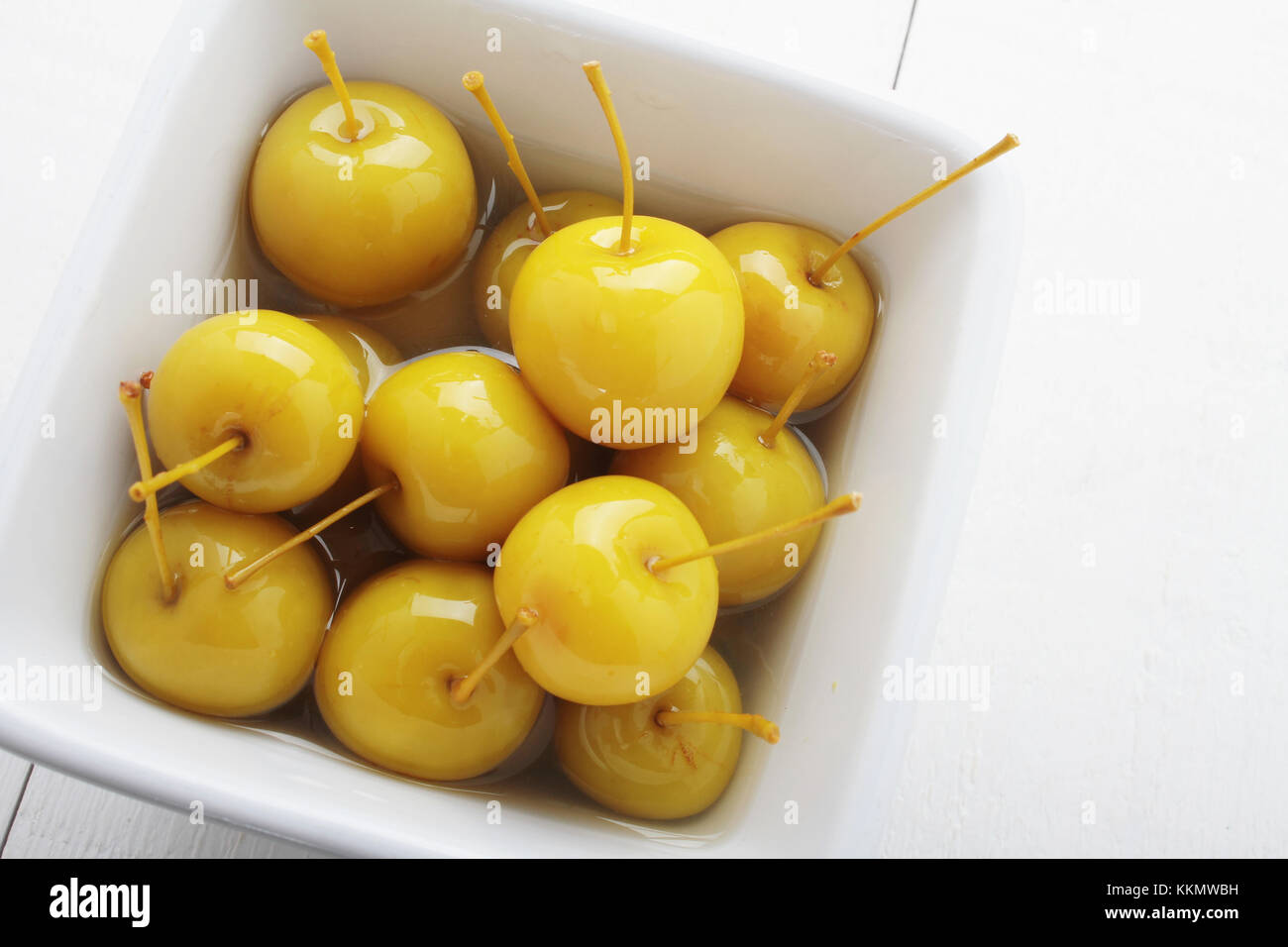 cheery apples in syrup Stock Photo - Alamy