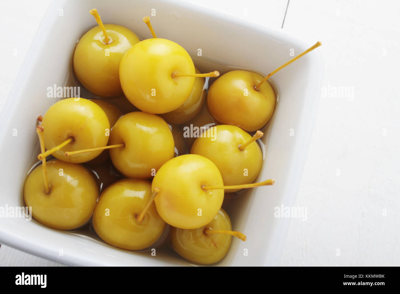 cheery apples in syrup Stock Photo - Alamy