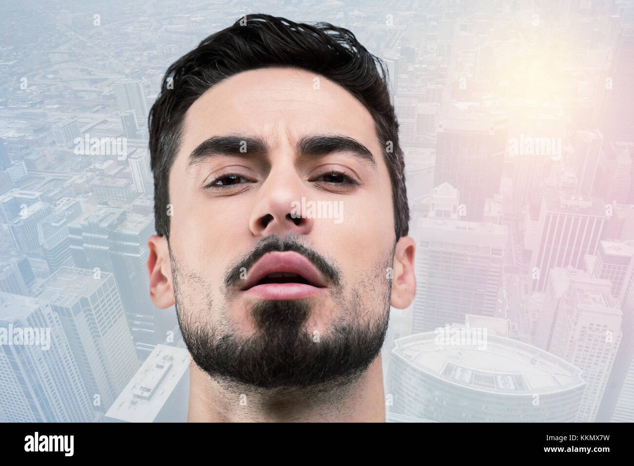 Confused model looking straight at camera Stock Photo - Alamy