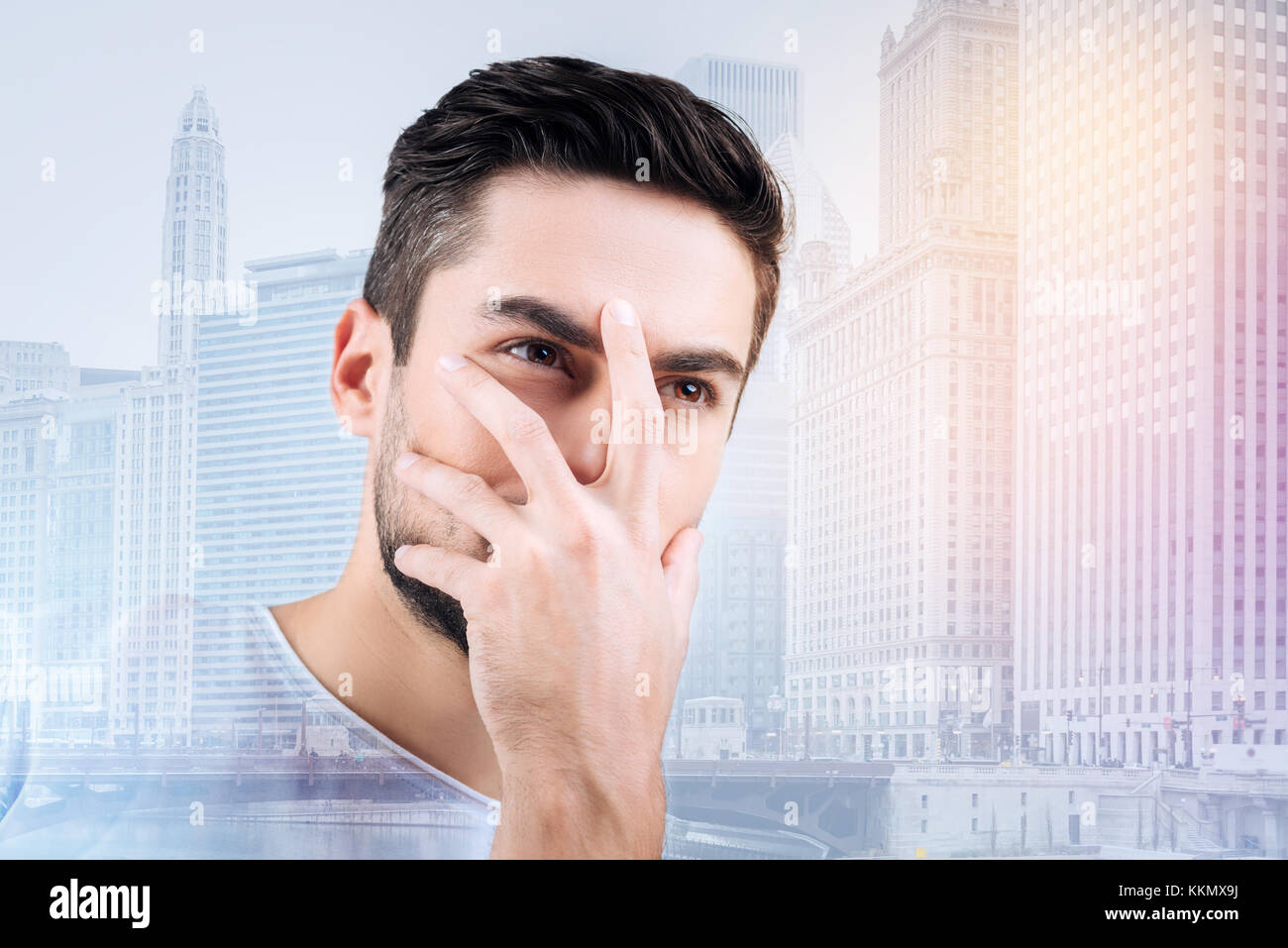 Thoughtful brunette man looking forward Stock Photo - Alamy