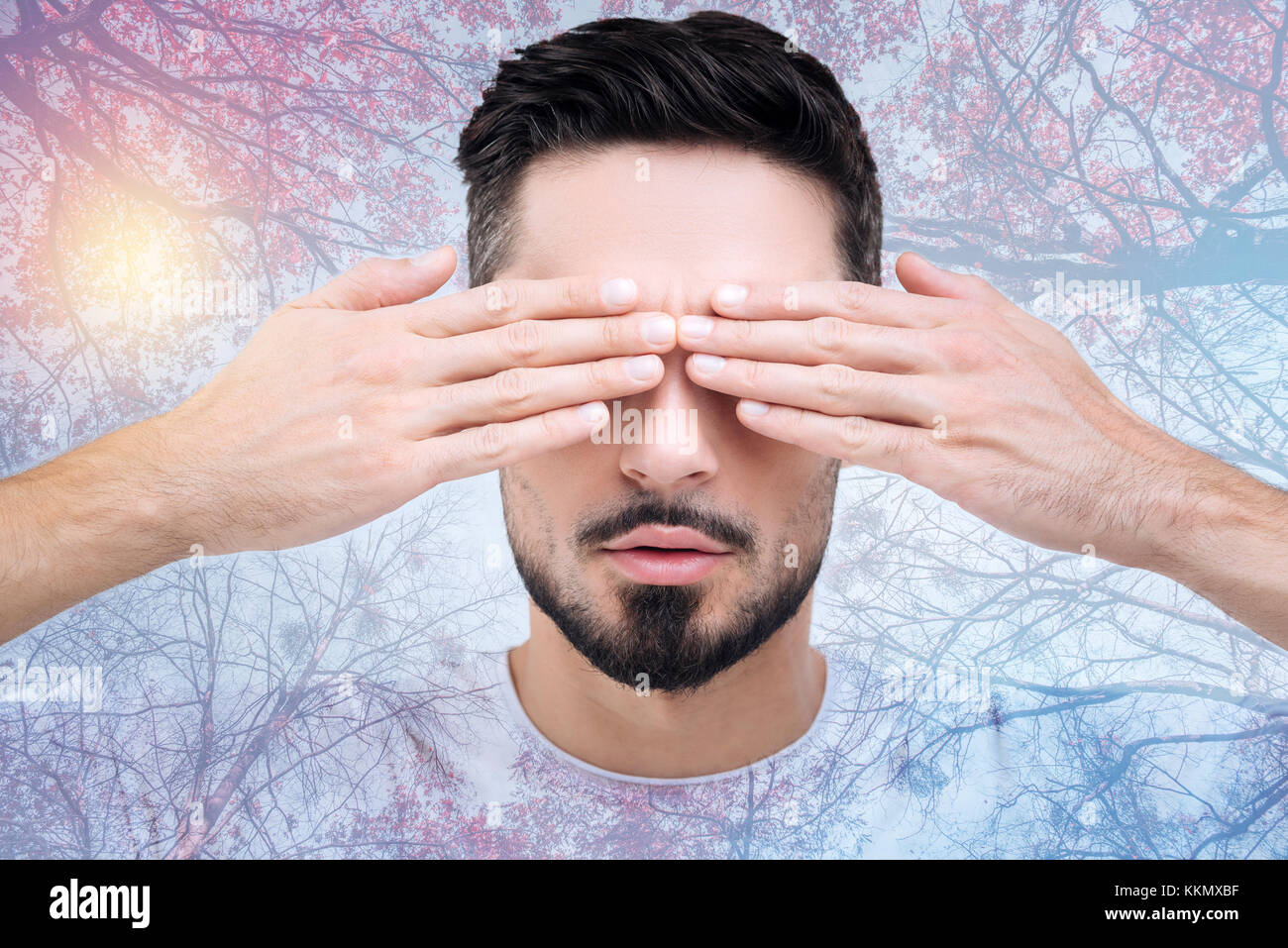 Depressed young man seeing nothing Stock Photo - Alamy