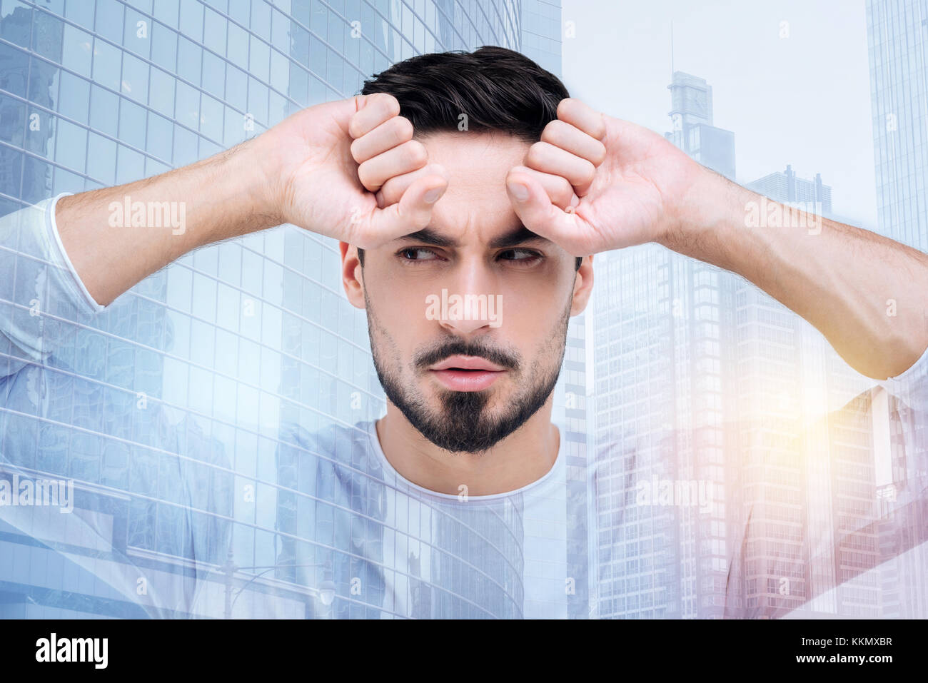 Enigmatical male person looking sideways Stock Photo - Alamy