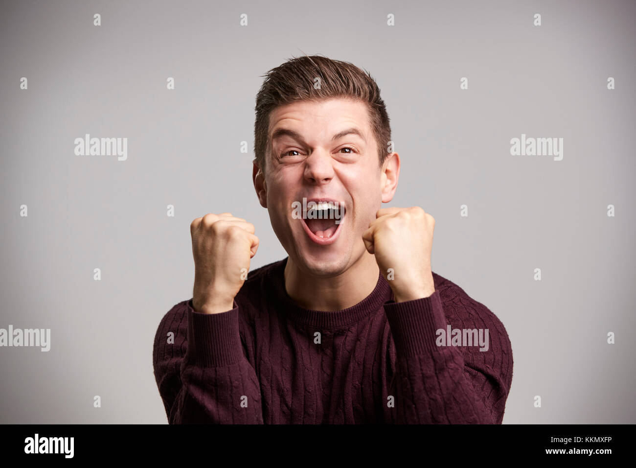 Person celebrating with arms up hi-res stock photography and images - Alamy