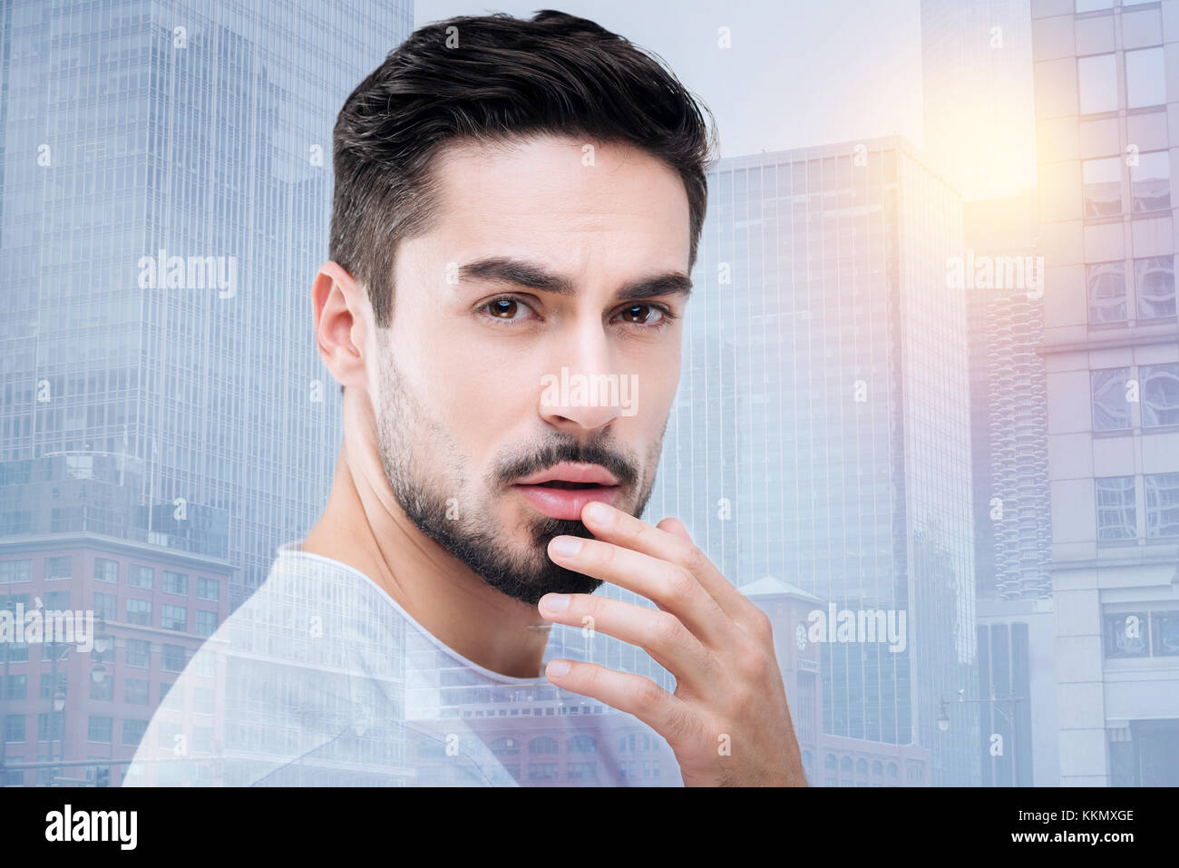 Serious male person posing on camera Stock Photo - Alamy