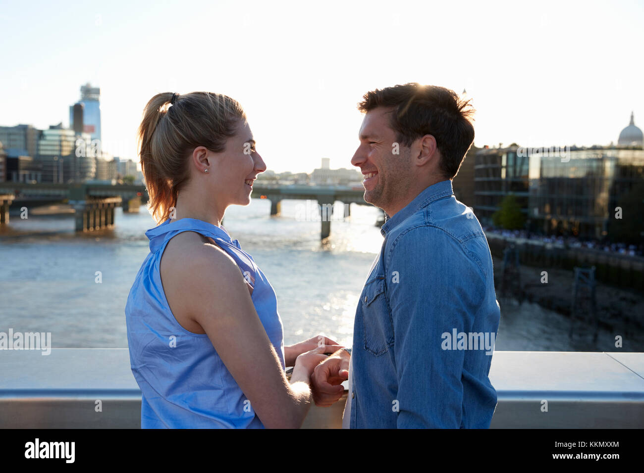Couple standing on bridge hi-res stock photography and images - Alamy